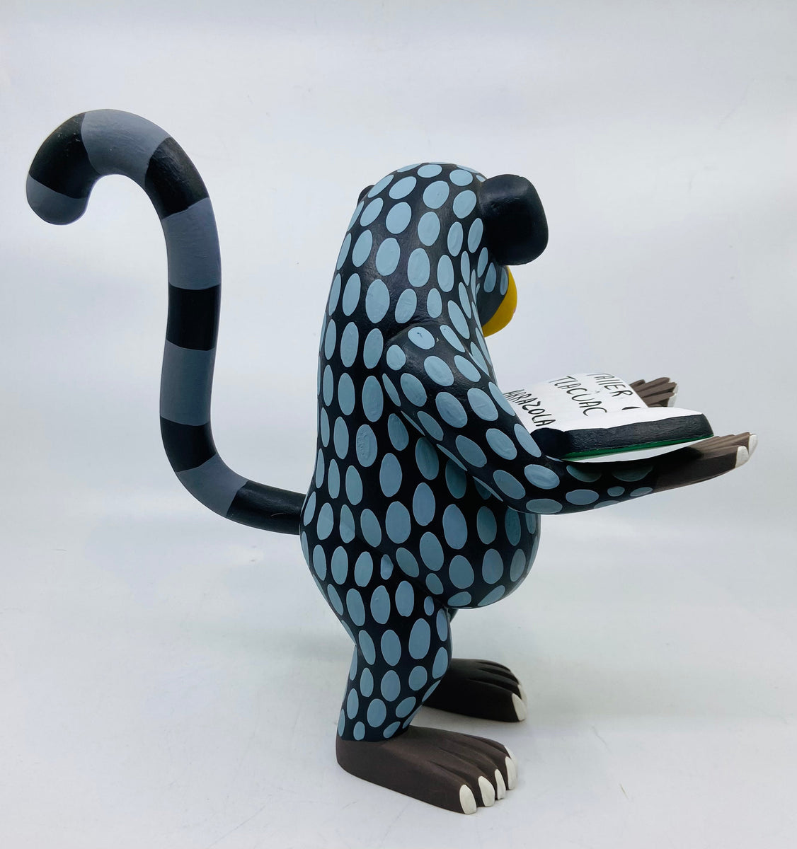 black-monkey-with-book-milagros-seattle-739682_1200x1200.heic?v=1713641962